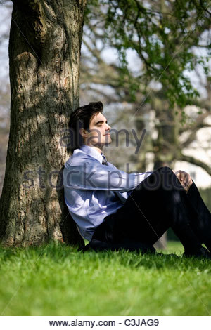 Man sleeping under a tree Stock Photo, Royalty Free Image: 28394544 - Alamy