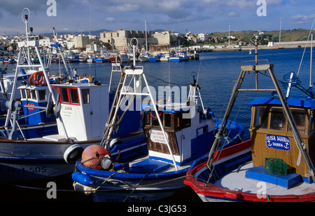 Castle Guzman el Bueno with fishing harbour in the foreground, Tarifa ...