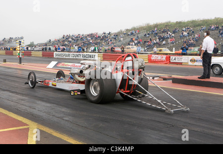 Red hot rod dragster on the start line Stock Photo - Alamy