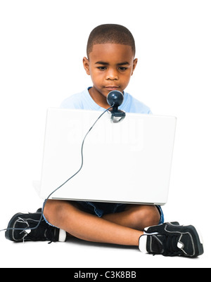 Child using internet isolated over white Stock Photo - Alamy
