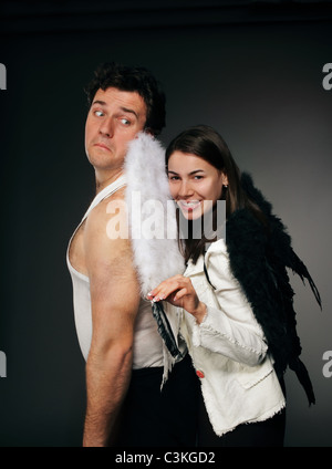 Mr. Angel and Mrs. Angel. Creepy character portrait Stock Photo - Alamy