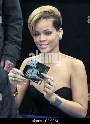 Singer Rihanna signing copies of her highly anticipated Def Jam ...