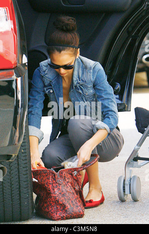 Jessica Alba puts her daughter in her stroller as they go shopping at ...