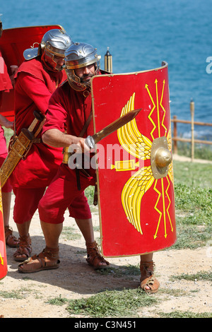 Roman Soldiers demonstrating defensive battle formation using shields ...