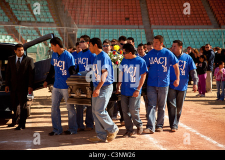 Teammates carry the coffin of a baseball player slain in the drug war ...