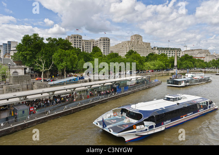Ferry - Thames Clippers berthed to Embankment Pier on the Thames River ...