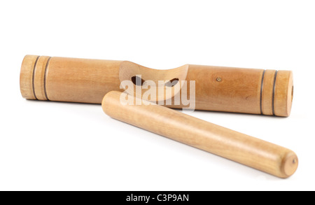 Wooden claves isolated on a white background Stock Photo - Alamy