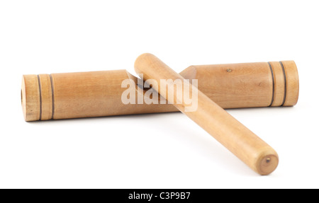 Wooden claves isolated on a white background Stock Photo - Alamy