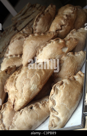The window of a Cornish Pasty Shop in Ilfracombe Devon with adverts for ...