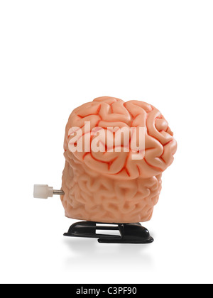 walking wind up toy human ear cut out on white Stock Photo - Alamy