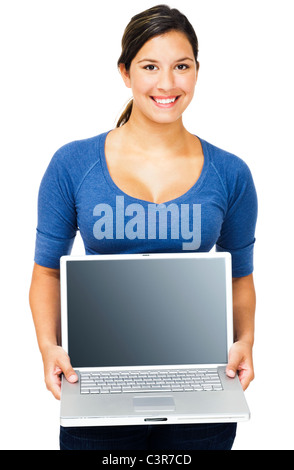 Hispanic woman standing over isolated background with sad expression ...