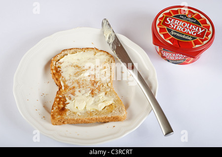 Tub of Spreadable Seriously Strong McLelland cheese spread Stock Photo ...
