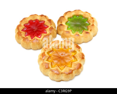 Cookies of yellow color with a stuffing from multi-colored jelly in the ...