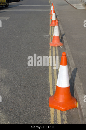 police traffic cones on the pavement to stop people parking when ...