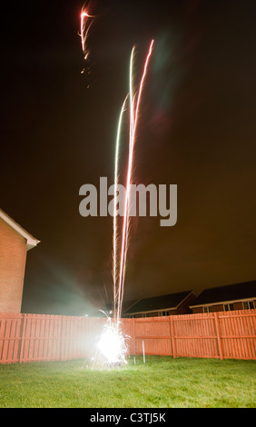 Fireworks in a back garden Stock Photo - Alamy