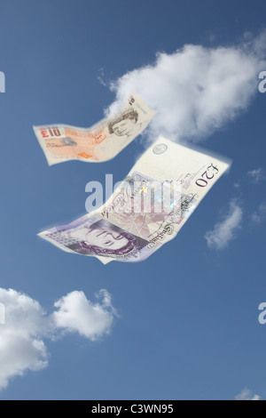 Money floating from above, British Pounds Stirling on a green ...