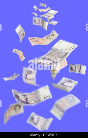 British pounds falling from the sky, man's hands reach up to try to ...