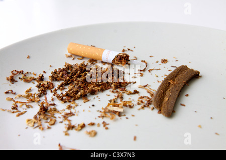 Moroccan hashish or hash, a cigarette, tobacco and a lighter to light ...