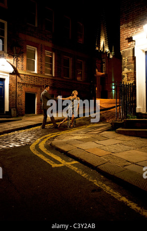 2 Tango dancers at night in Paradise Square Sheffield Stock Photo - Alamy