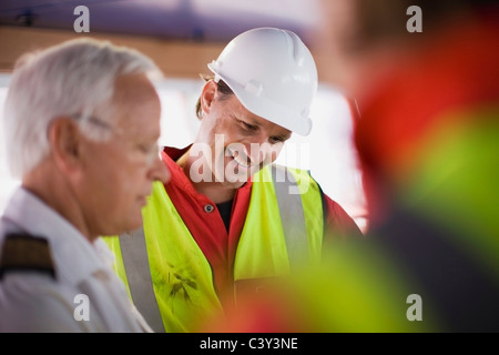 Captain and workers of a ship Stock Photo - Alamy