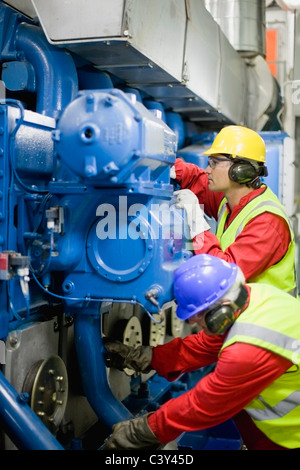 Man doing maintenance works Stock Photo - Alamy