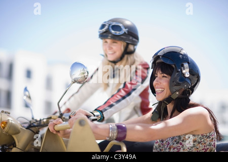 Two Women Riding Motorcycle & Sidecar Stock Photo - Alamy