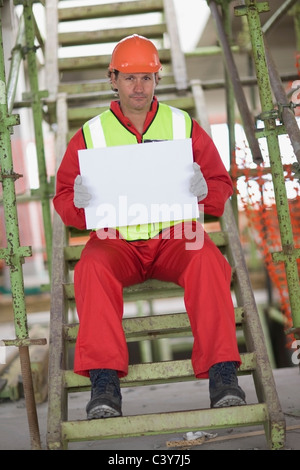 Man holding blank sheet of paper on color background, closeup Stock ...