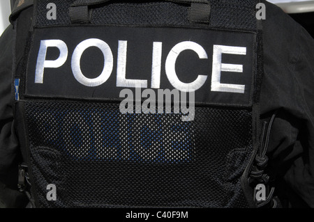 An armed Police officer of The Specialist Firearms Command SCO19 ...