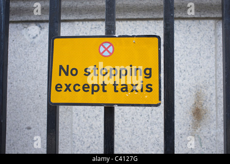 No stopping sign and yellow road markings outside a village primary ...