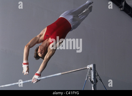 Male gymnast on horizontal bar Stock Photo - Alamy