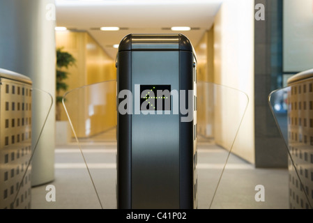 Turnstiles in building lobby Stock Photo - Alamy