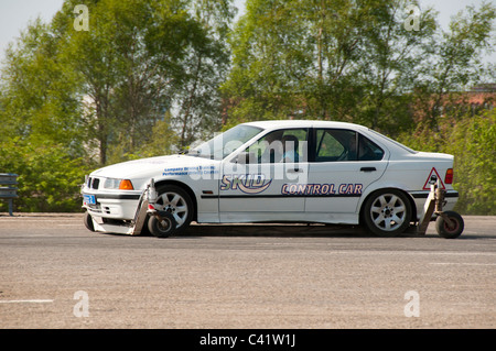 Skid control training car. The outrigger wheels can be raised or or ...