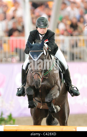 Caroline Chew of Singapore riding GATINEAU during the Singapore Youth ...