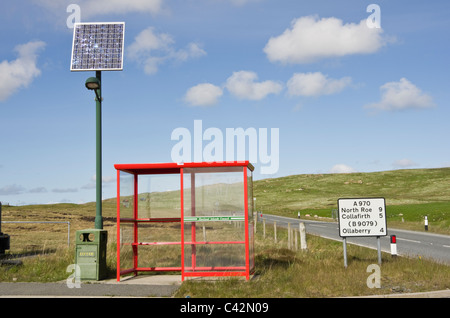 Rural bus stop on the country road with the forest on the background ...