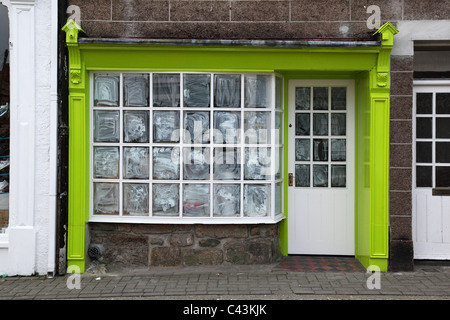 White paint strokes on a shop window, abstract background or texture ...