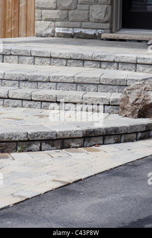 Brick steps and front door of house Stock Photo - Alamy
