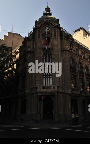 Blue sky neo-classical Intendencia de Santiago Building and 2 policemen ...