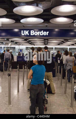 People arriving at the UK border immigration control at Gatwick South ...