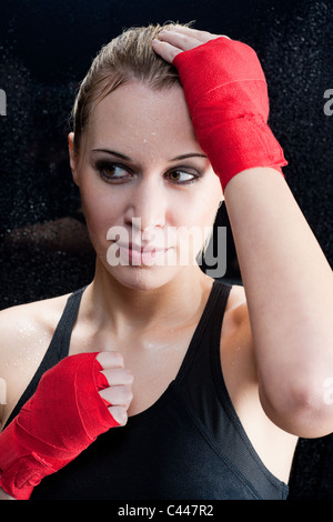 Boxing training blond woman sparring and sweating Stock Photo - Alamy