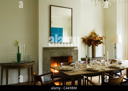 laid table by the fireplace Stock Photo - Alamy