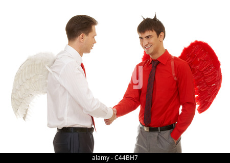 Handshake of god and devil isolated on white background Stock Photo - Alamy