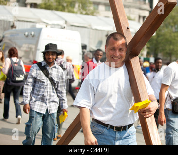 Man carrying a wooden cross in Easter, London, England, Uk Stock Photo ...