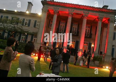 Evening reception on the lawn grounds of the British Embassy, in Tokyo ...