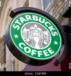 A round Starbucks sign Stock Photo - Alamy