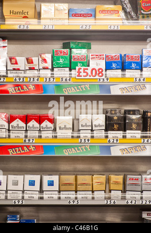 Cigarette Display Behind A Shop Counter Stock Photo - Alamy