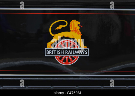 A British Railways logo on a steam train tender at Penrith station in ...