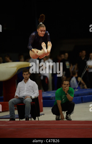 Gymnastics competition: a gymnast performing a double back full twist ...