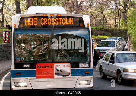M106 MTA Public Bus Crossing Central Park onto 5th Avenue, New York ...