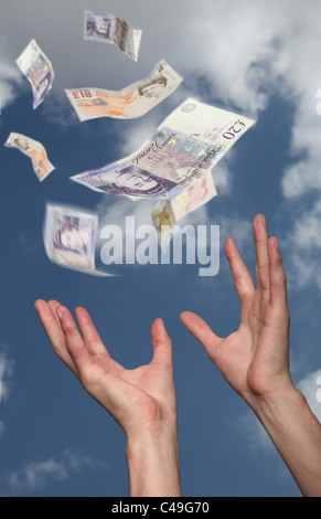 Money (British Pounds Stirling) floating from above Stock Photo - Alamy