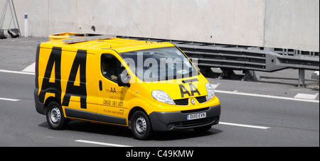 AA Automobile Association yellow van driving on UK motorway that deals ...